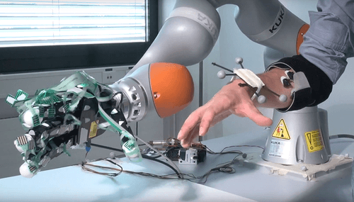 Smart Artificial Hand Combines User and Robotic Control for Assistive ...