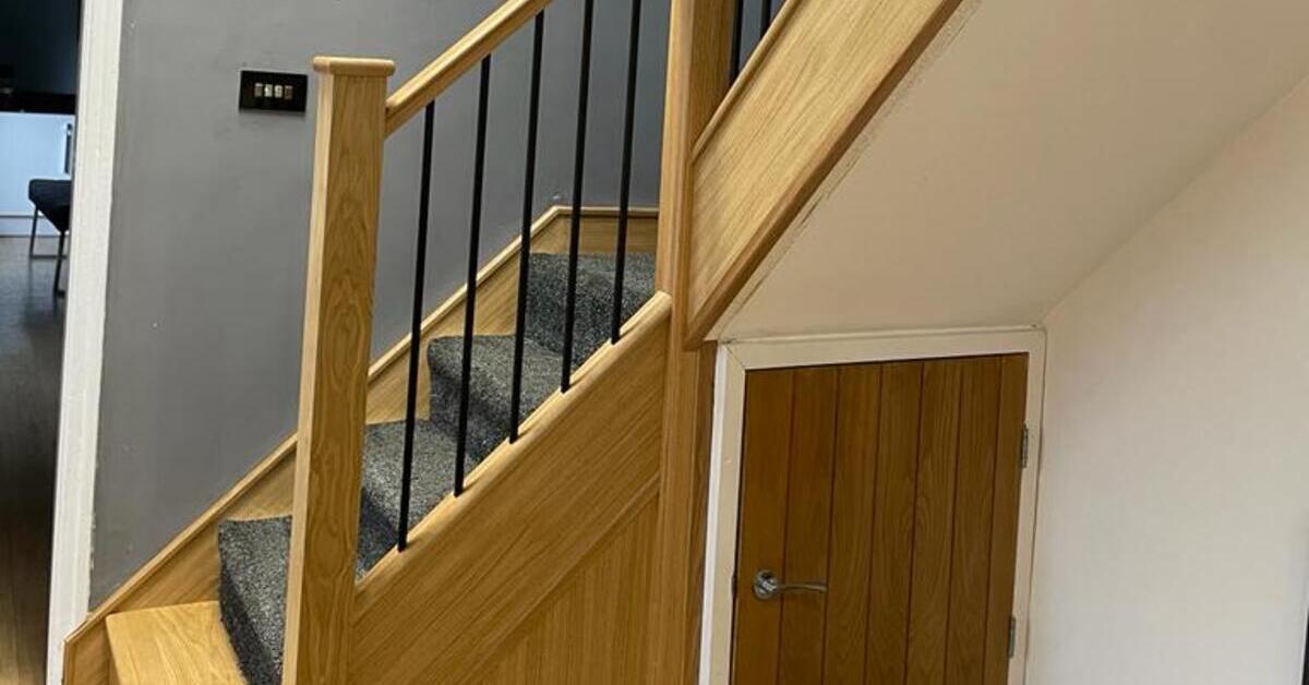 Solid Oak Staircase Renovation Featuring Black Metal Spindles | The ...