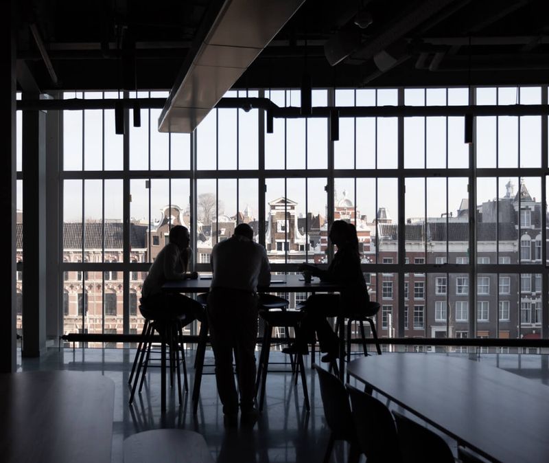 About - AXOM Partners