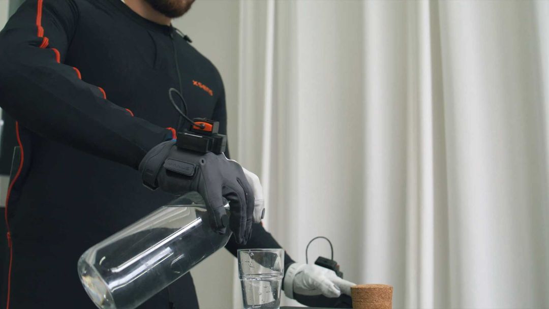Bridging Simulation and Reality for Robot Skill Learning with MANUS ...