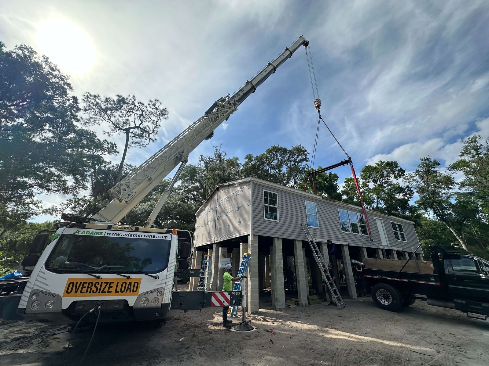 Adams Crane© - Modular Homes Crane Services