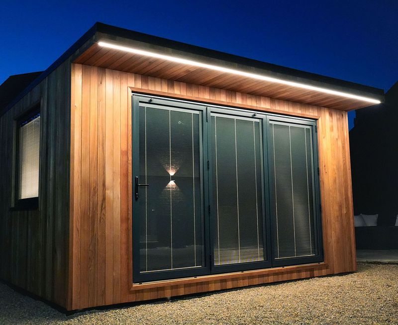 Tim’s modern garden gym with eco roof, black interior & timber cladding