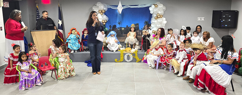 Children from the Department of Housing's Care Center celebrate their ...