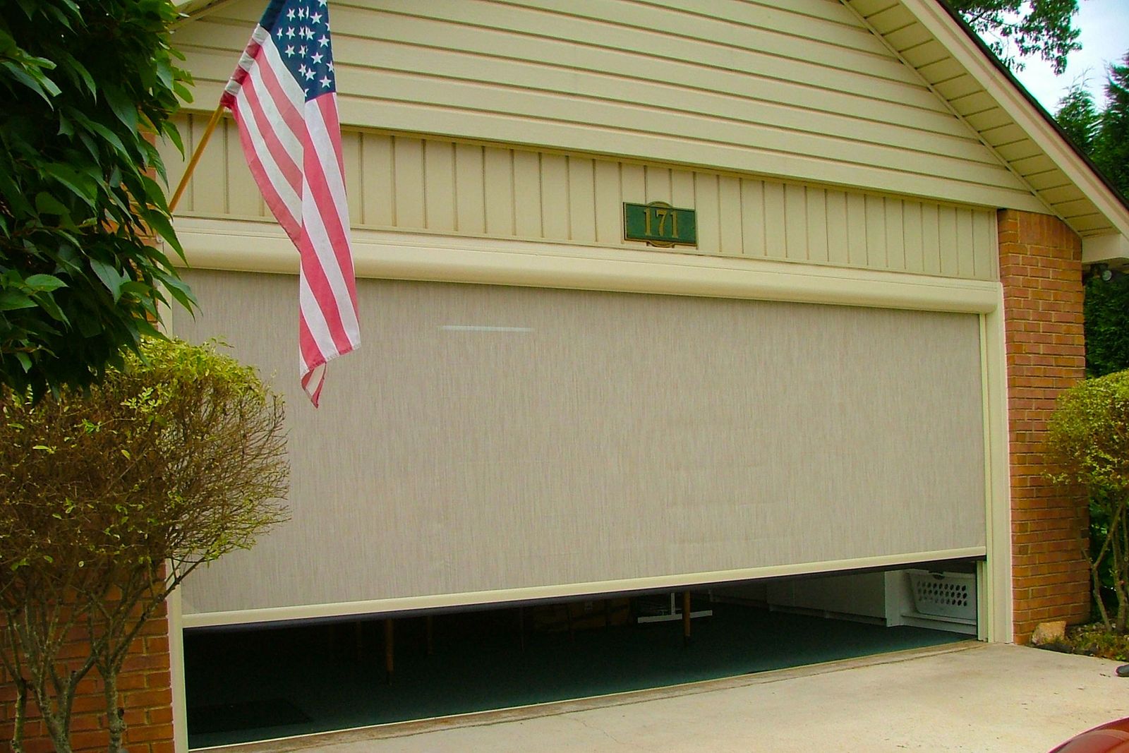 SolarRoll Motorized Garage Door Screens | RollShield